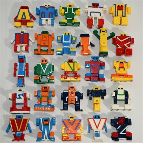Vintage Alpha Bots Transforming Robot Transformer 26 Letter Set From