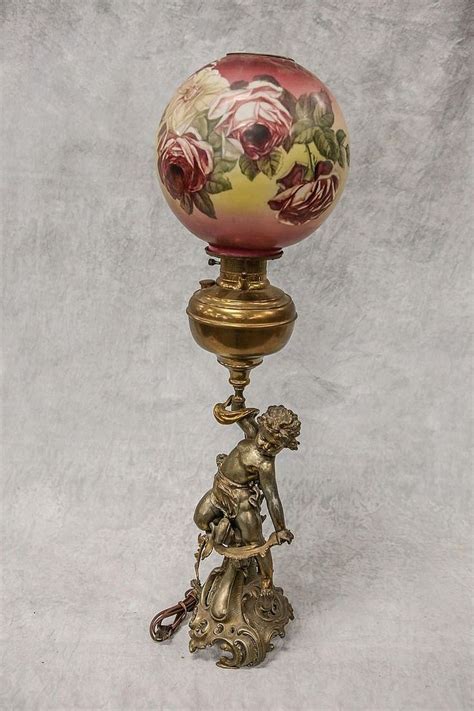 Sold At Auction White Metal And Brass Victorian Cherub Banquet Lamp