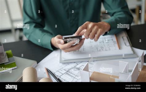 Architecture Man Use Smart Phone For Architectural Creative Project
