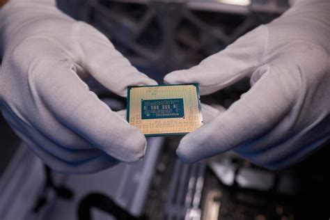Premium Photo Cropped Image Of An Engineer Showing A Computer Microchip On The Foreground