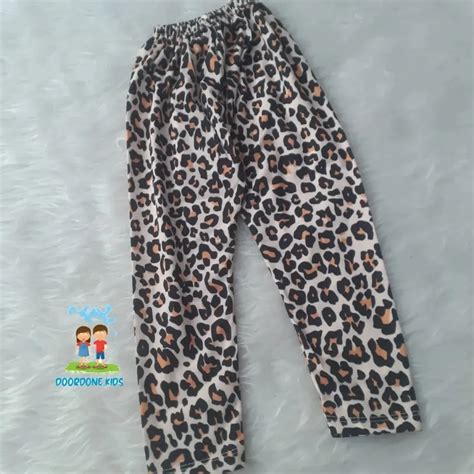 کمدا قیمت و خرید تیشرت ساپورت دخترانه پلنگ رنگ سفید سایز 35404550