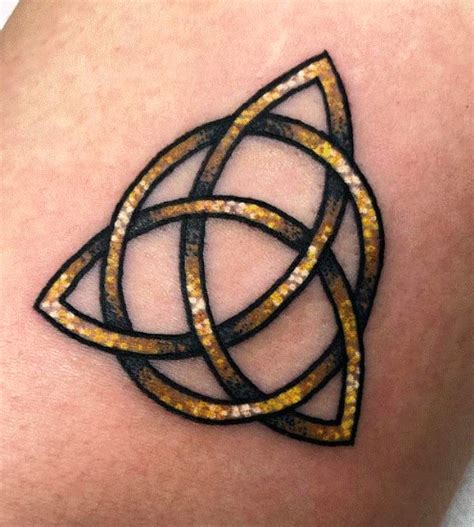 30 Amazing Triquetra Tattoos With Meanings Ideas And Celebrities