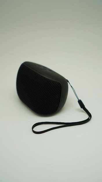 Premium Photo A Black Speaker With A Cord Attached To It