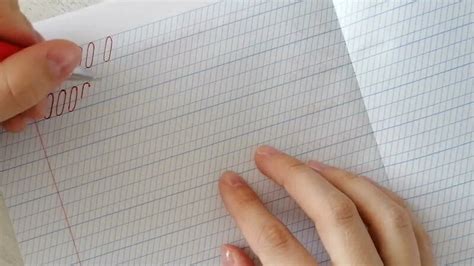 Письмо в тетради с частой косой линией Заглавная буква О