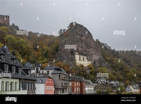 An Old Half Timbered Town In Autumn Church Built Into A Rock