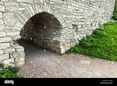 Stone Fortress Wall With An Empty Gateway Kremlin Of Pskov Russia