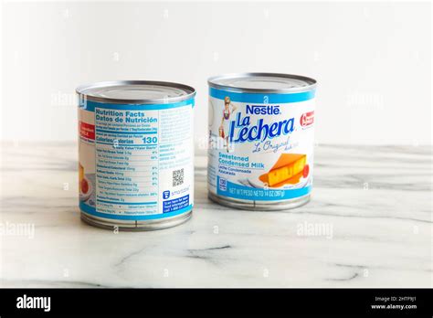 2 Tins Of Nestle La Lechera Sweetened Condensed Milk Showing Front And