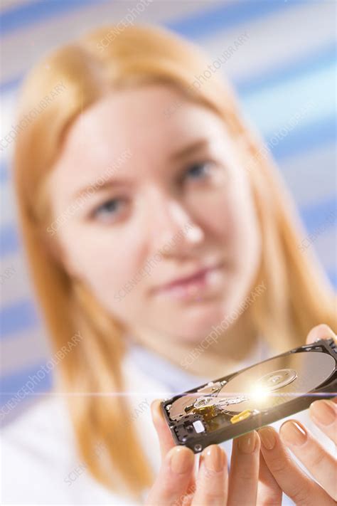 Woman Holding A Hard Disc Drive Stock Image F013 2357 Science Photo Library
