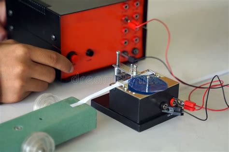 Science Classroom Students Are Conducting A Physics Experiment On The Speed Of Objects Using A