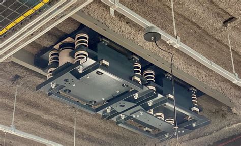 Vibration Control Of A Floor System Using Tuned Mass Dampers