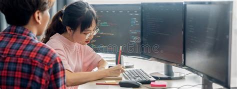 Group Of Professional Web Developer Discuss About Data Analysis