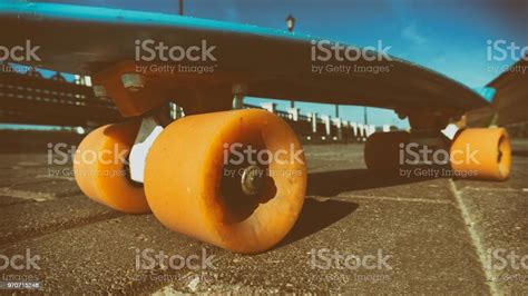 Closeup To Skateboard Wheels On Rough Brick Road 80s Vintage Style
