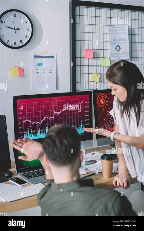 Selective Focus Of Information Security Analysts Pointing With Hands On