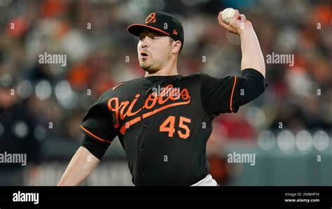 Baltimore Orioles Relief Pitcher Keegan Akin Throws A Pitch Against The