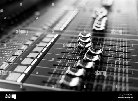 Professional Audio Mixing Console With Faders And Adjusting Knobs Tv Equipment Black And White