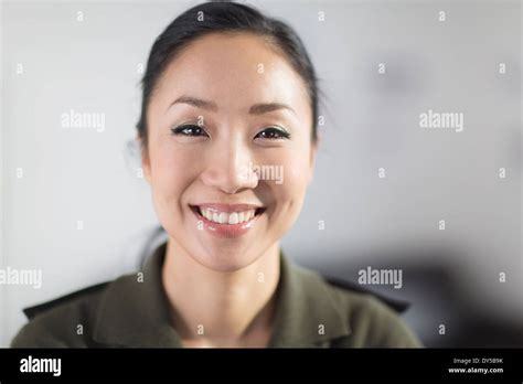 Portrait Of Mid Adult Woman Smiling Stock Photo Alamy