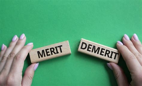 Merit Or Demerit Symbol Concept Word Merit Or Demerit On Wooden Blocks