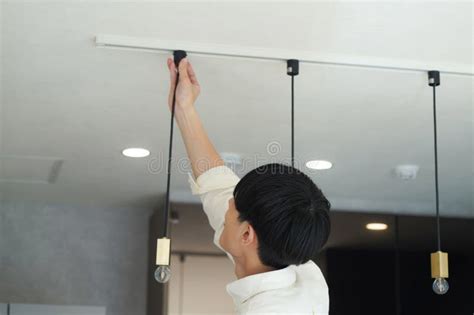 Man Installing Lighting Fixtures Stock Image Image Of Indoors Architecture