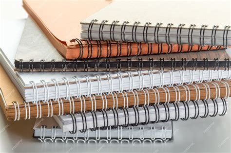 Premium Photo Pile Of Notebooks