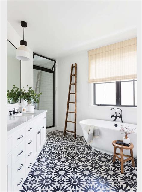 Download A Bathroom With Black And White Tiled Floors