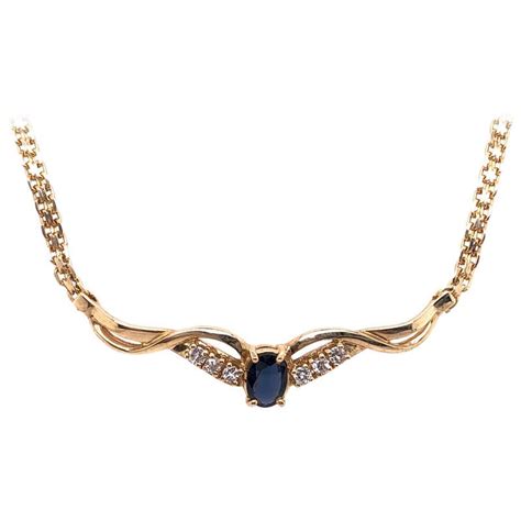 14 Karat White Gold Sapphire And Diamond Pendant Necklace For Sale At