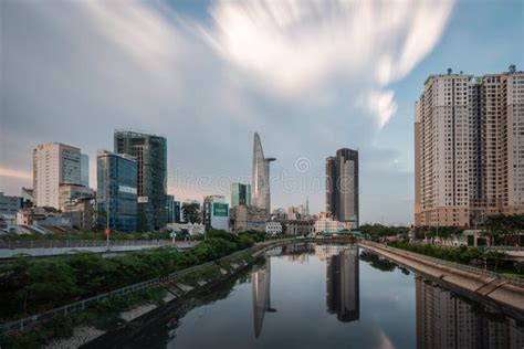 Saigon Cityscape At Sunrise Skyline With Cloudy Sky Modern City