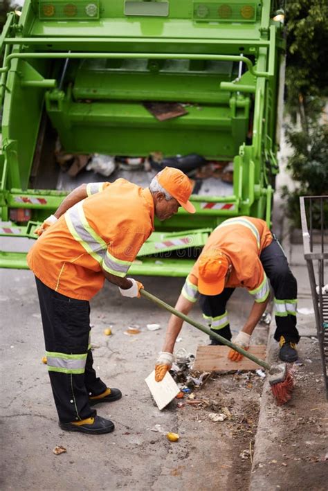 Garbage Collection Day A Garbage Collection Team At Work Stock Image