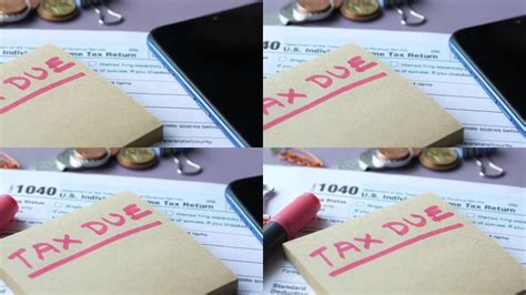 报税表和手写的应缴税款视频素材下载编号18743715光厂vj师网
