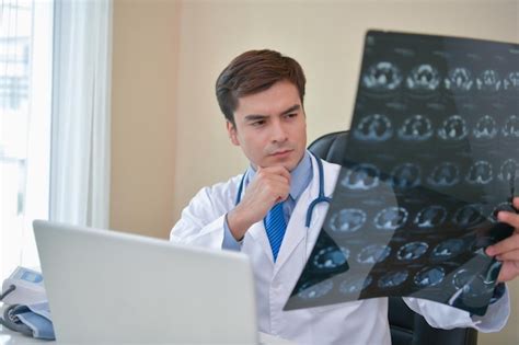 Premium Photo Doctor Analyzing X Ray Image In Hospital