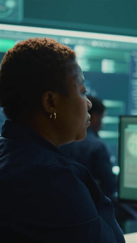 Vertical Governmental Hackers Analyzing Big Data For Cyber Threat Detection Working At Agency