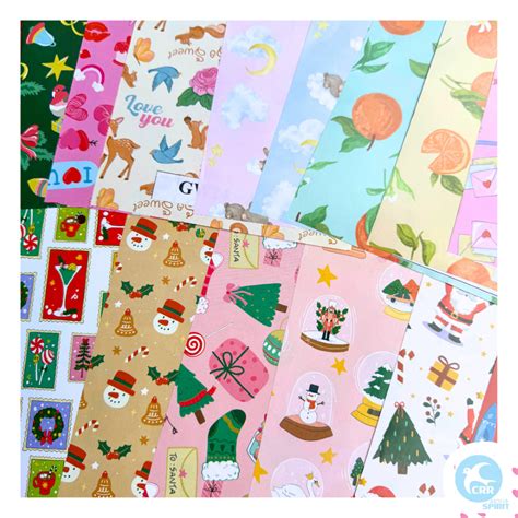 [แพ๊ค100แผ่น] Spirit กระดาษห่อของขวัญ น่ารัก คริสมาส ขายส่ง คละลาย 80g Shopee Thailand