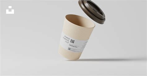 뚜껑이 있는 커피 컵이 표시됩니다 사진 Unsplash의 무료 컵 이미지