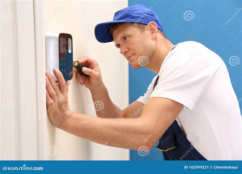 Male Technician Installing Security Alarm System Stock Image Image Of Code Alarm 162999221