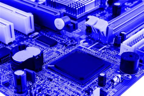 Microchip On Blue Circuit Board Stock Photo Image Of Hardware Board