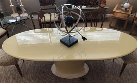 A Good Quality And Sleek American 1970s Lacquered Oval Dining Table
