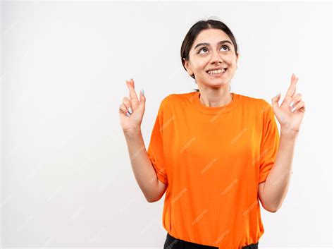 Free Photo Young Girl Wearing Orange T Shirt Making Desirable Wish