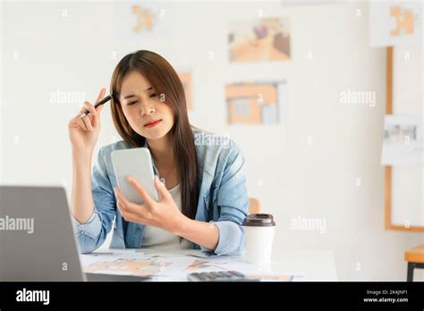 Construction Design Concept Female Architect Using Smartphone During