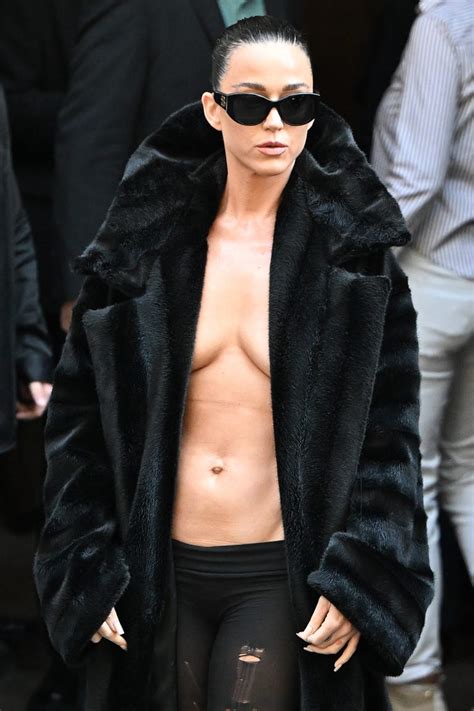 Katy Perry Goes Topless Under An Open Coat At Balenciagas Show