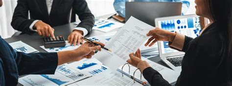 Analyst Team Working On Data Analysis Dashboard On Laptop Screen