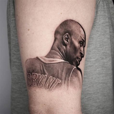 Micro Realistic Kobe Bryant Portrait Tattoo On The