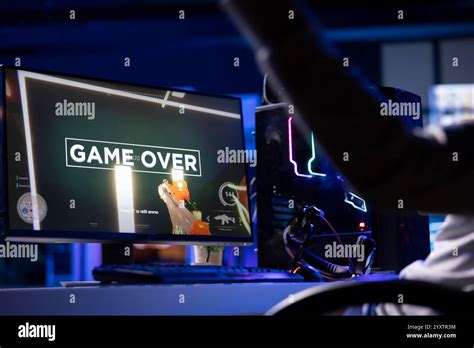 Gamer Throwing Headphones In Frustration After Receiving Game Over Screen In First Person