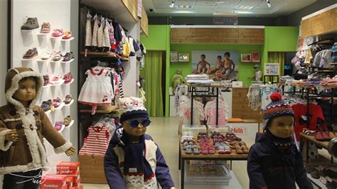 خرید لباس بچه در کیش معرفی فروشگاه های لباس بچه کیش بوک