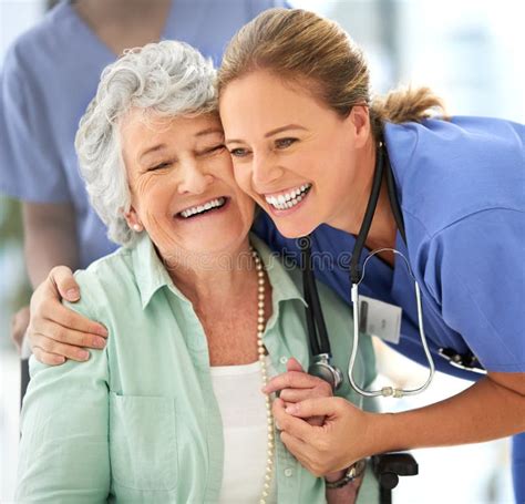 Nurse Senior Woman And Happy Hug Of Caregiver And Smile With Support