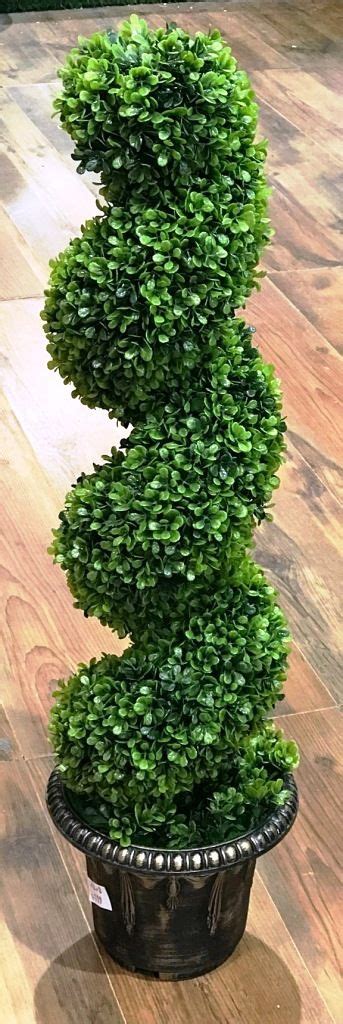 מתקן צמחים מעוצב בצורת אות E