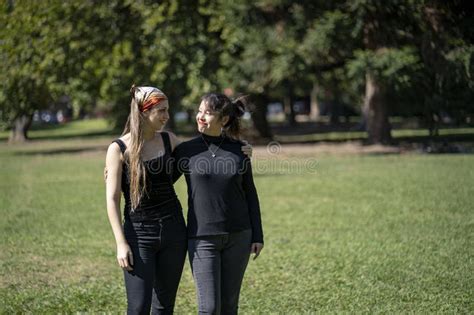 Couple Of Women Hugging In A Park Stock Photo Image Of Happiness Female