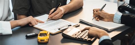 Premium Photo Car Dealer Calculate Interest Rate And Costs Of Car