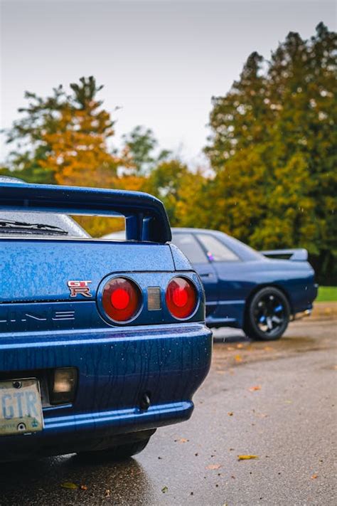 교통 닛산 스카이라인 Gt R 셀렉티브 포커스 여행 파란색 스포츠카 현대적인 확대에 관한 무료 스톡 사진