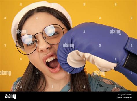 Funny Punching Face Teenage Fun Boxer Girl In Boxing Gloves On Yellow