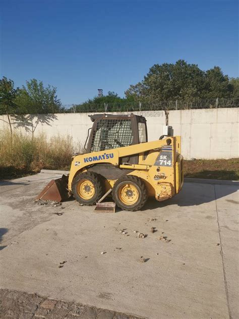 Челен Товарач Товарач Коматцу Sk 714 Строителна автотехника Бургас Мини Челен Товарач