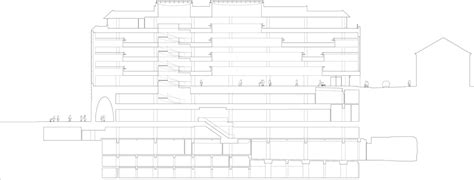 Curving Voids Pierce The Floors Of Anttinen Oivas Helsinki Library